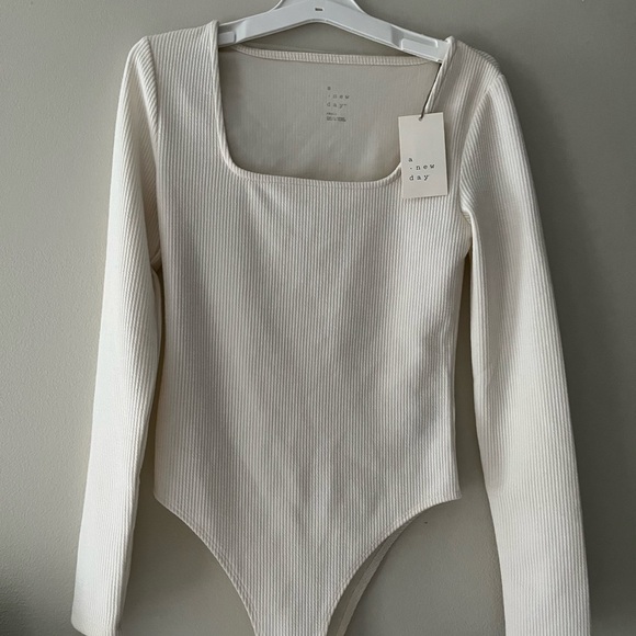 Target | Tops | Target Cream Ribbed Long Sleeve Bodysuit | Poshmark